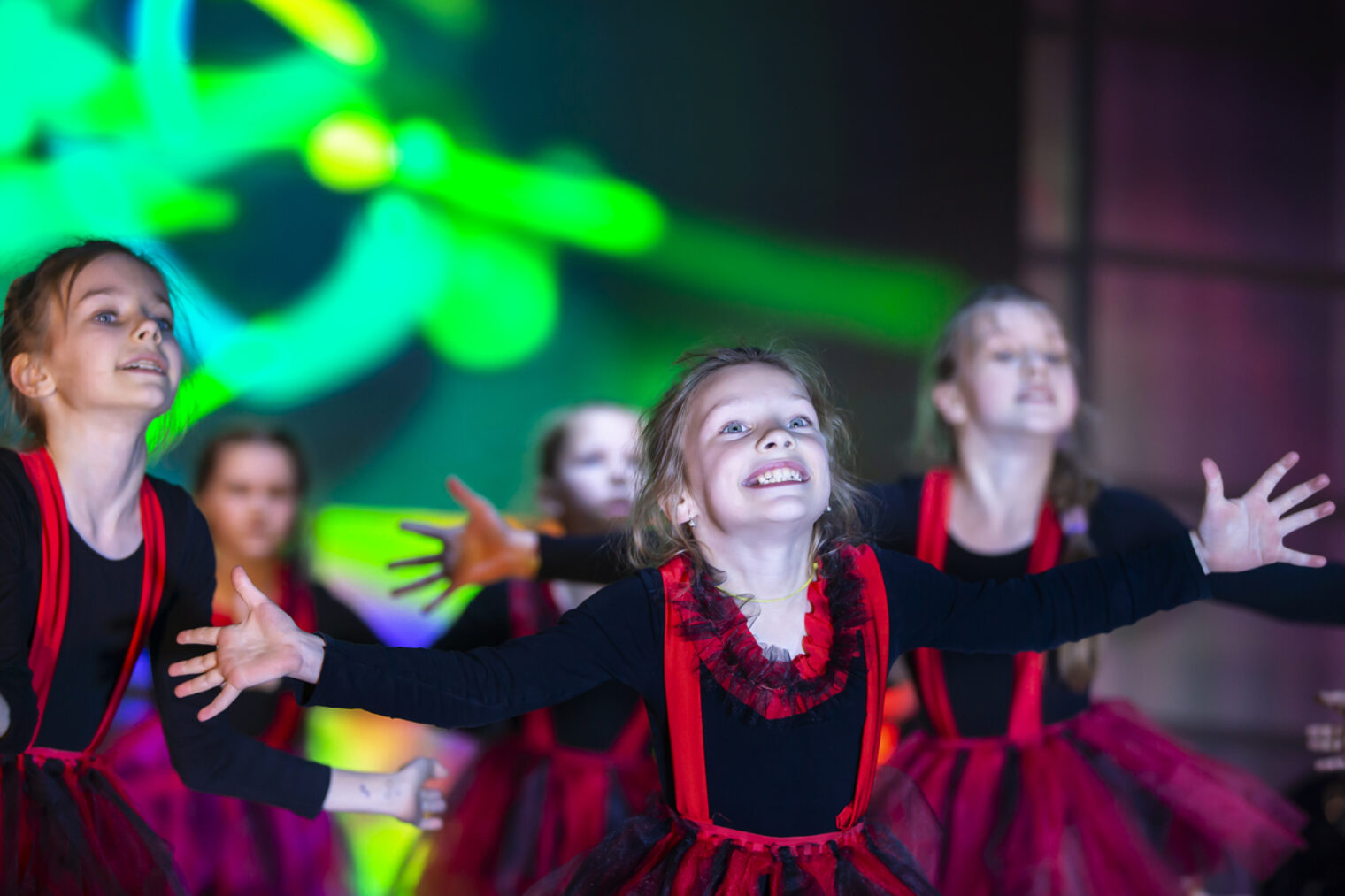 Little Girls Are Performing A Dance Number Dance For Helovinna In Red little-girls-are-performing-a-dance-number-dance-for-helovinna-in-red